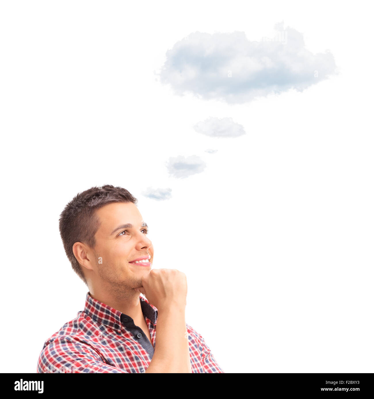 Young pensive man contemplating something with a cloud floating over ...