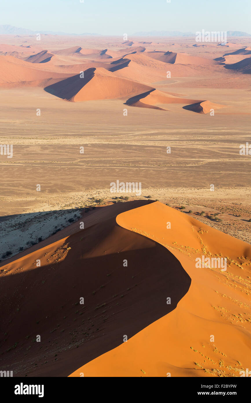 Sand dunes in the Namib Desert, in the evening, aerial view, Namib ...