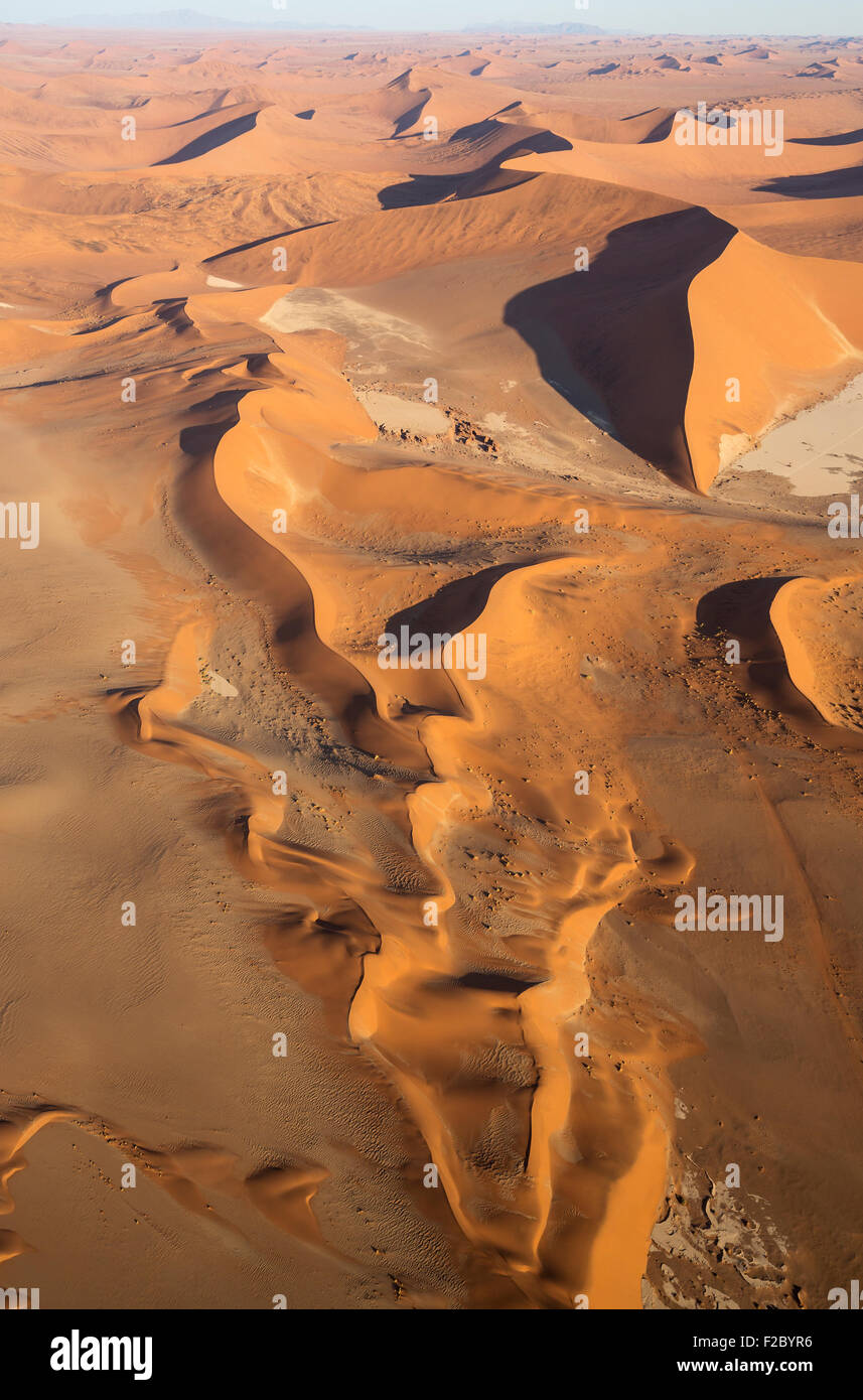 Sand dunes in the Namib Desert, in the evening, aerial view, Namib ...