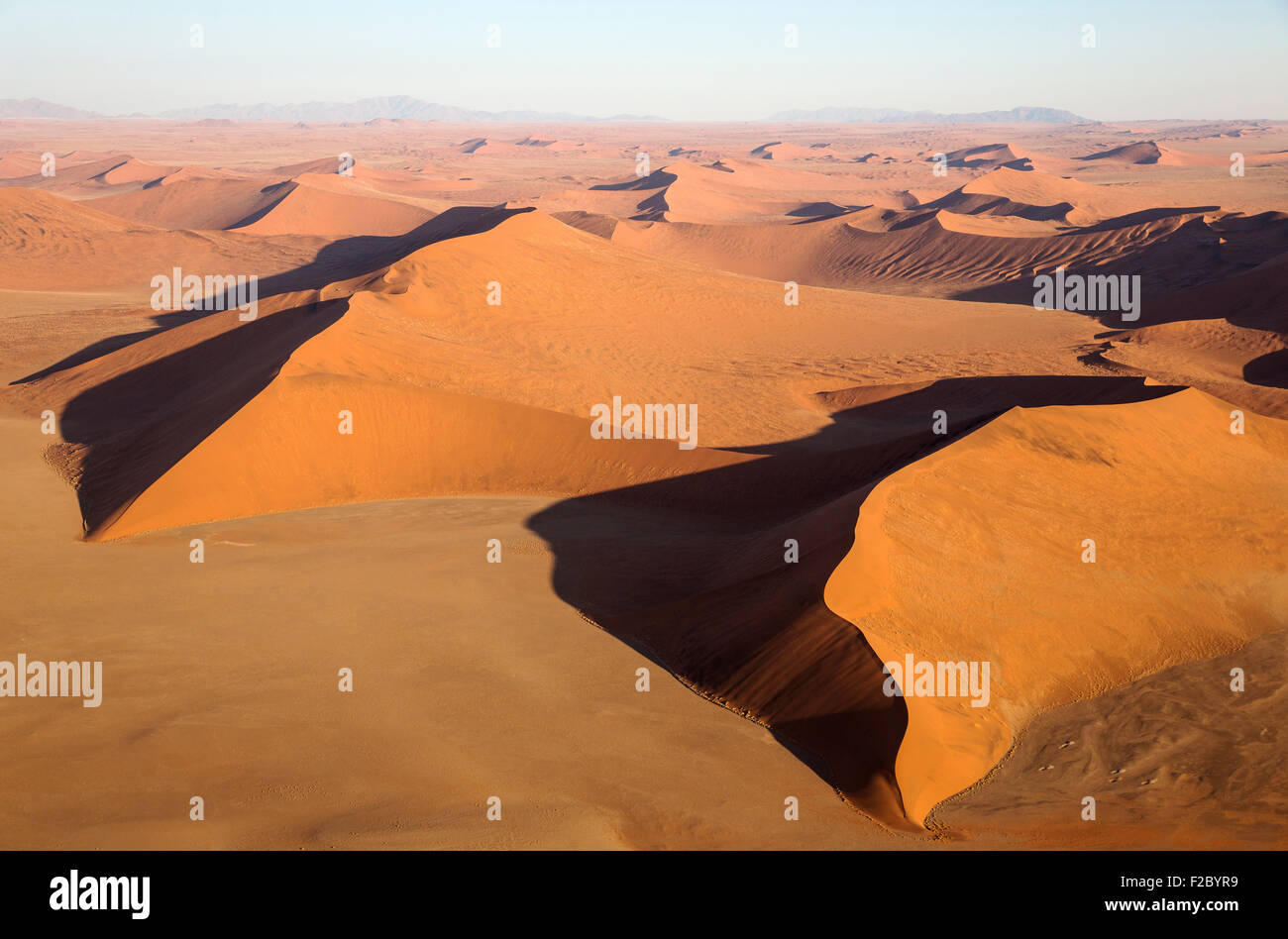 Sand dunes in the Namib Desert, in the evening, aerial view, Namib ...