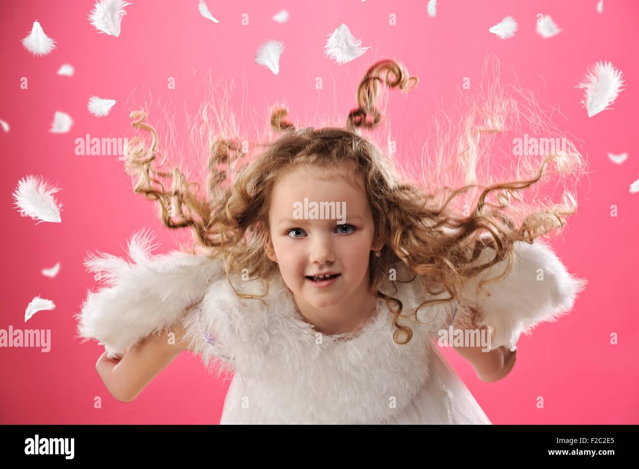 Beautiful little angel girl Stock Photo - Alamy