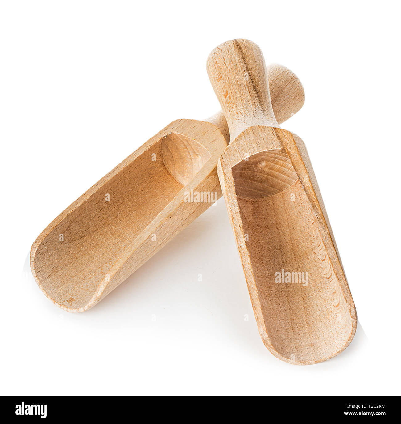 wooden scoops isolated on a white background Stock Photo - Alamy