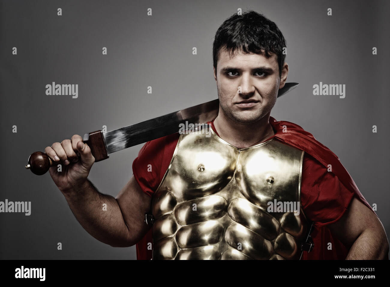 Handsome roman legionary soldier Stock Photo - Alamy