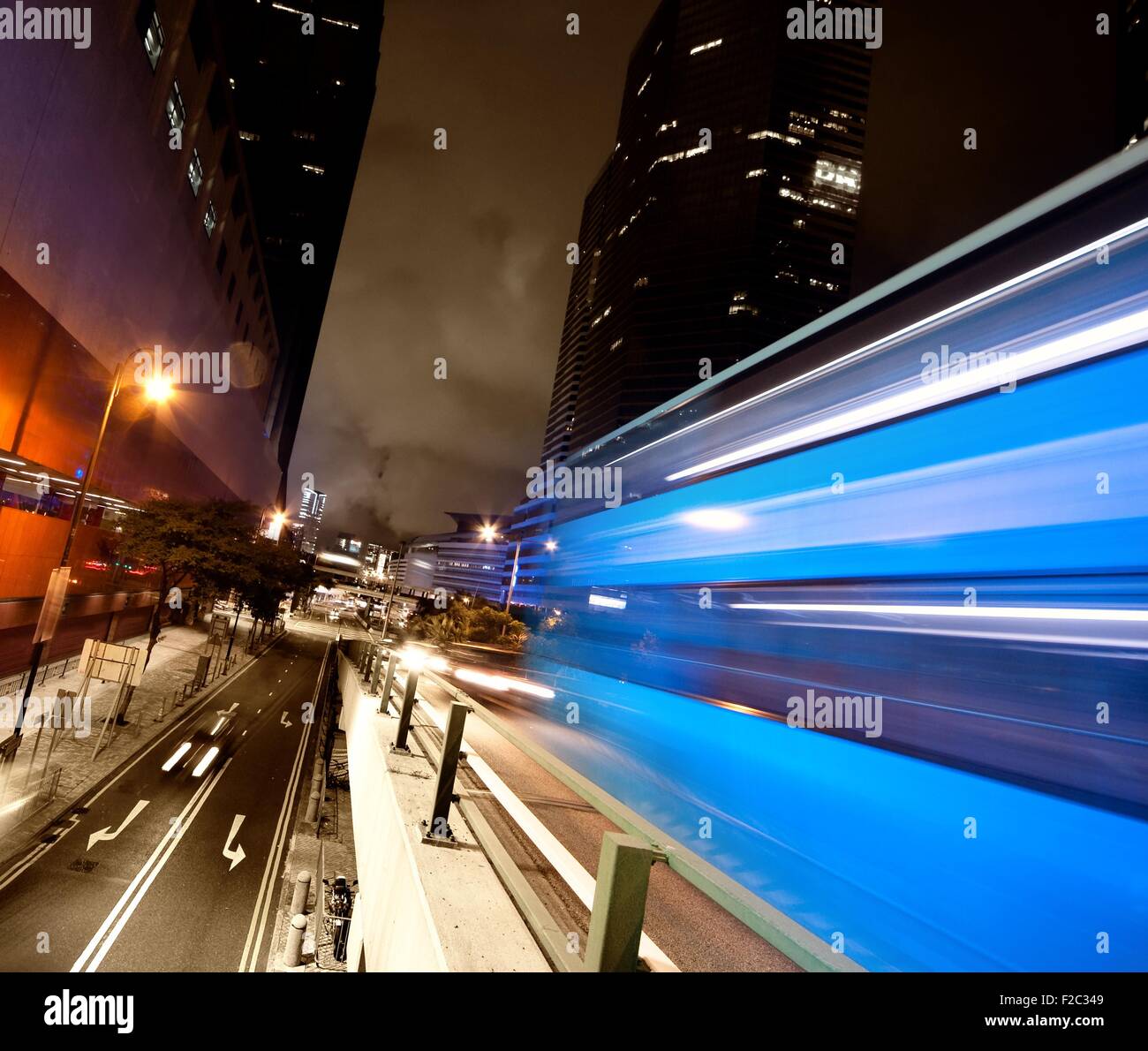 Fast moving bus at night Stock Photo - Alamy