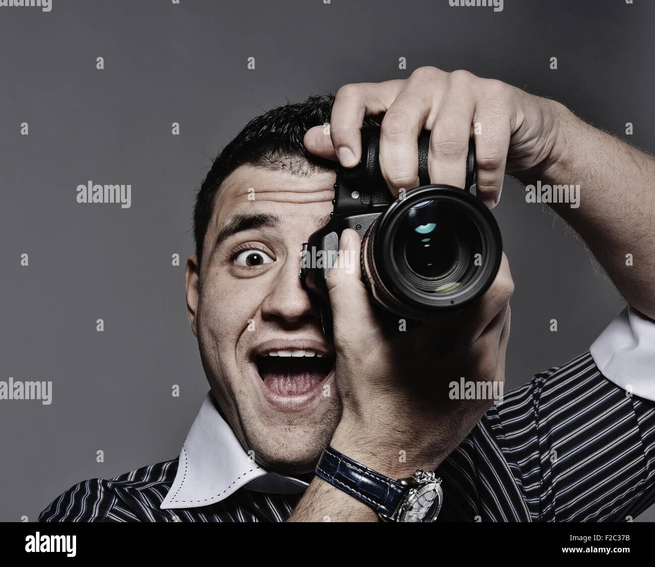 Photographer making a shot Stock Photo - Alamy