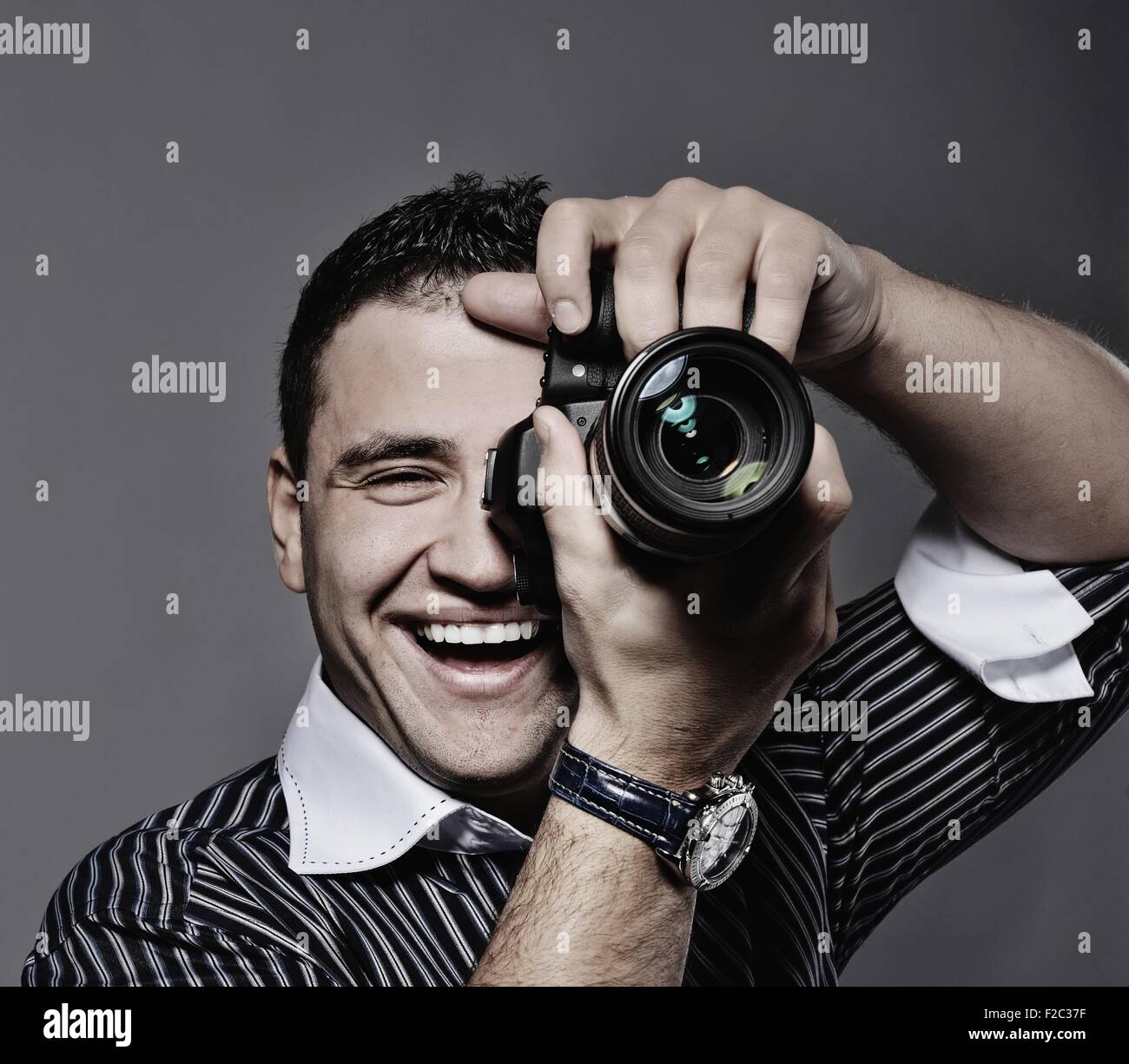 Photographer making a shot Stock Photo - Alamy