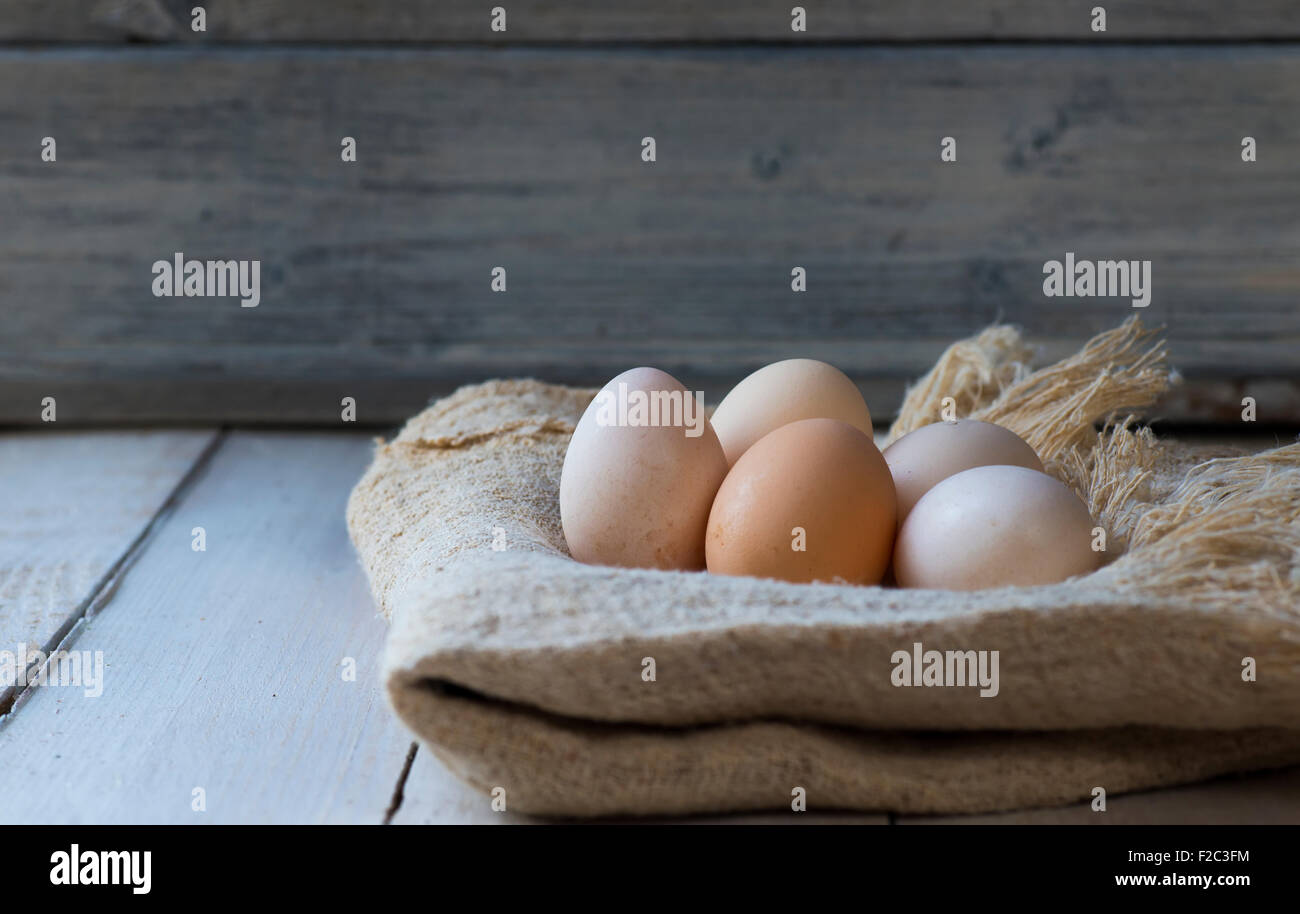 Bio eggs on wood table Stock Photo - Alamy