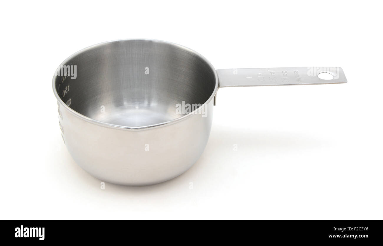 Empty American metal measuring cup, isolated on a white background ...