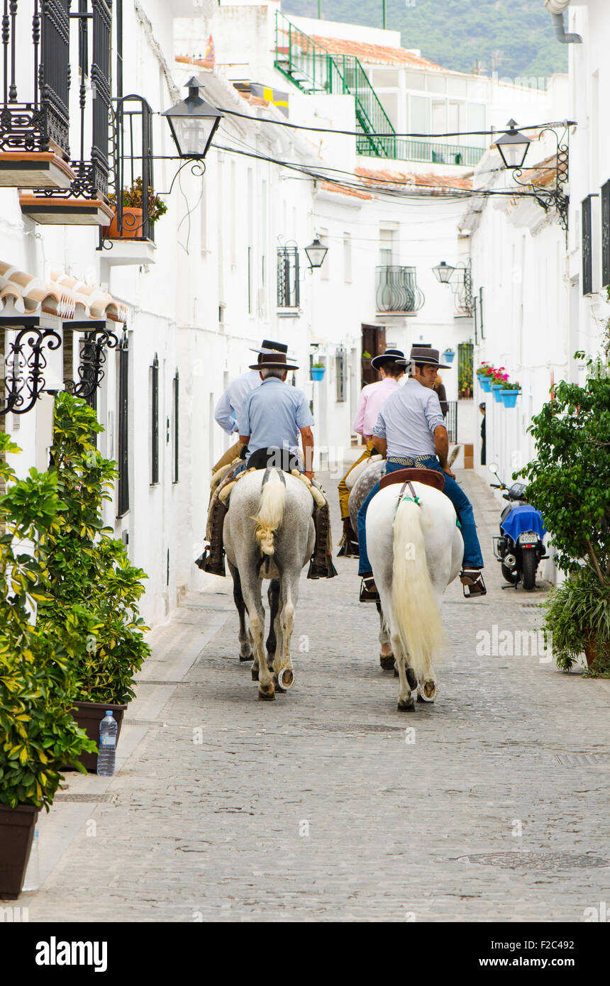 Men on horses wearing Cordobes hats in traditional costume in white ...