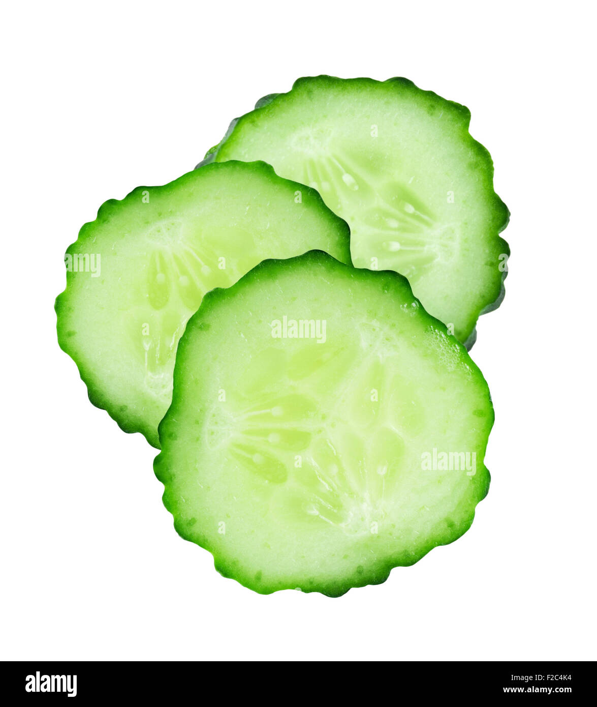 Fresh cucumber slices on white background Stock Photo - Alamy