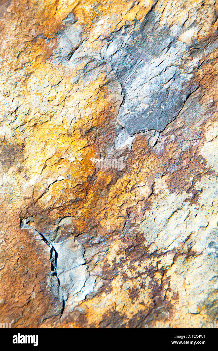 rocks stone and red orange gneiss in the wall of morocco Stock Photo ...