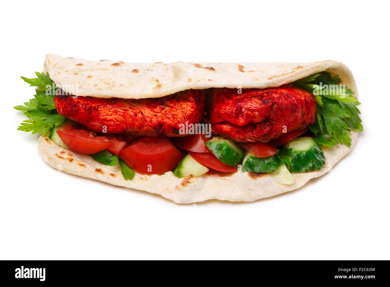 Chicken Tikka masala naan sandwich. Indian takeaway. Studio shot ...