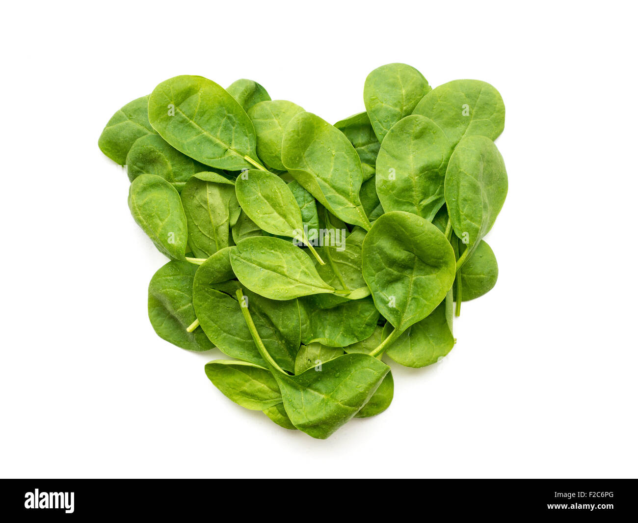 fresh green spinach leaves arranged in shape of heart Stock Photo - Alamy