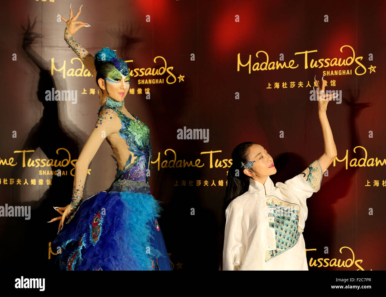 Shanghai, China. 16th Sep, 2015. Chinese dancer Yang Liping (R) poses ...