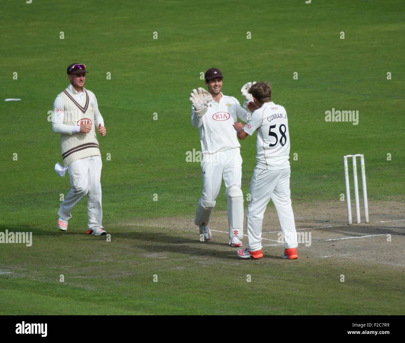 Manchester, UK 16th September 2015 Sam Curran (Surrey) receives ...