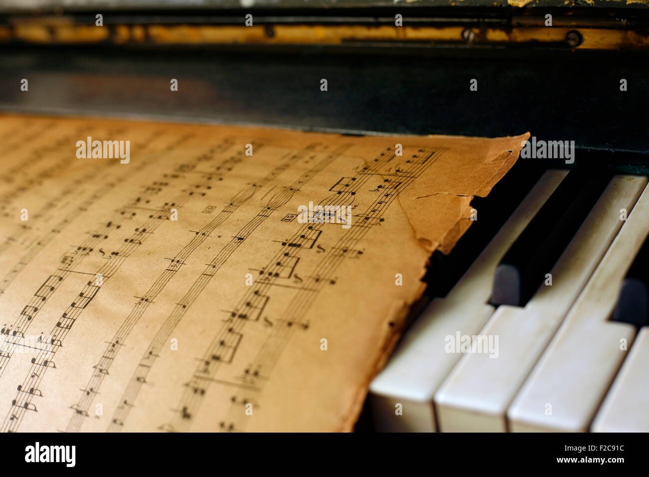 The keyboard of the piano and old notes Stock Photo - Alamy