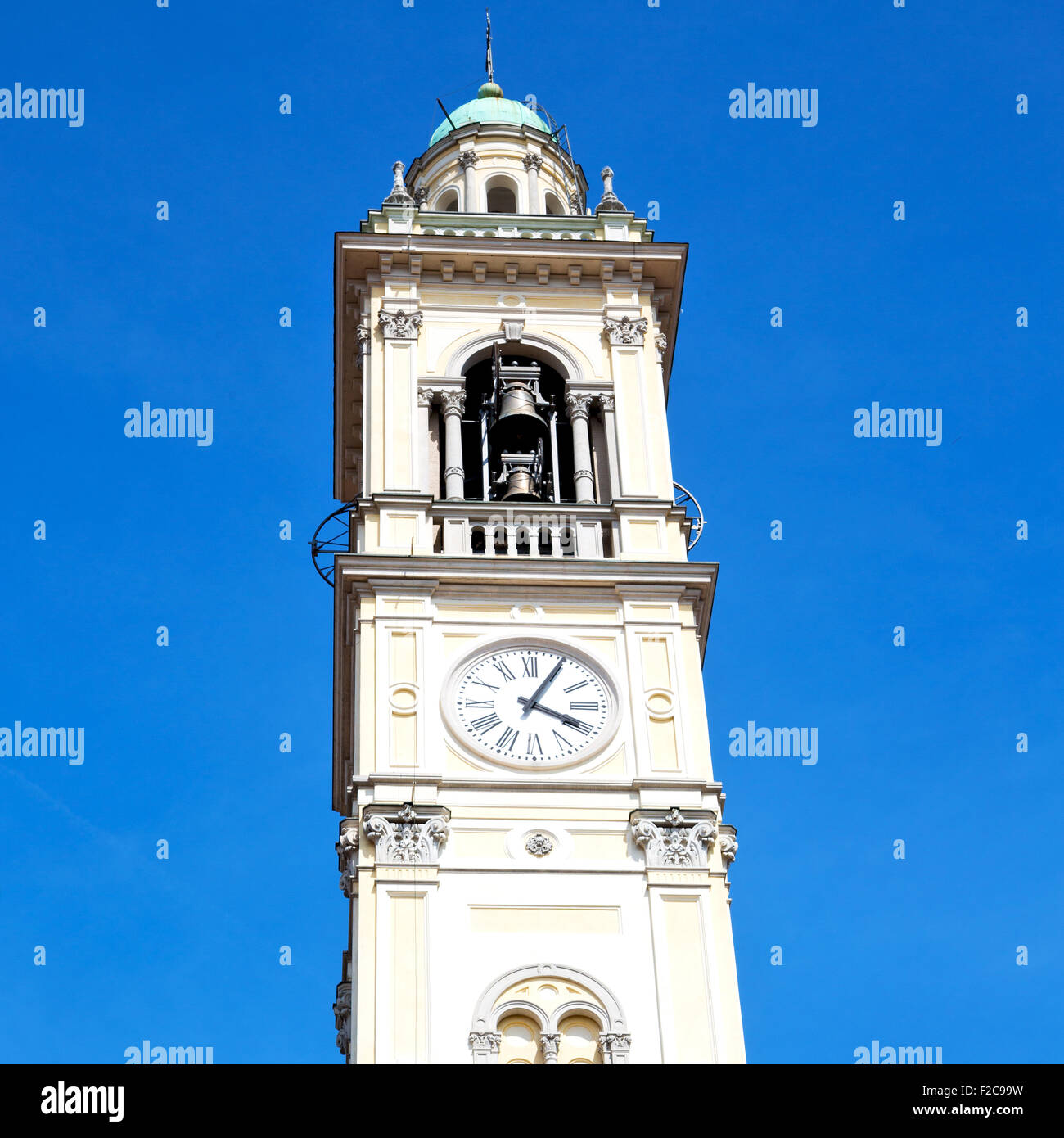 ancien clock tower in italy europe old stone and bell Stock Photo - Alamy