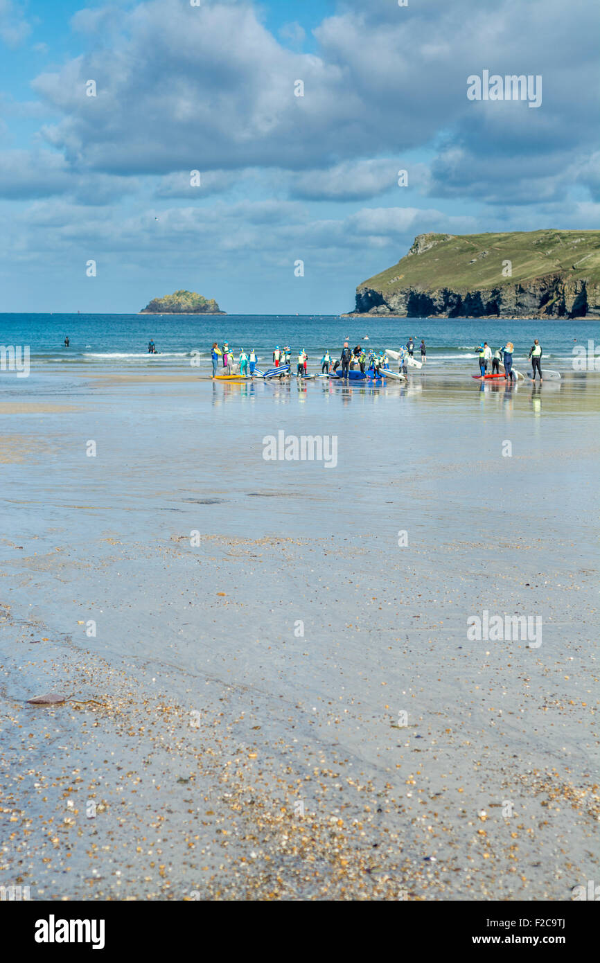 Surf school headed for the water. View of Polzeath/Hayle Bay, North ...
