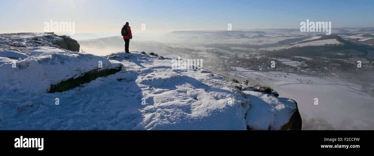 Winter snow, Adult male walker on Curbar Edge, Peak District National ...