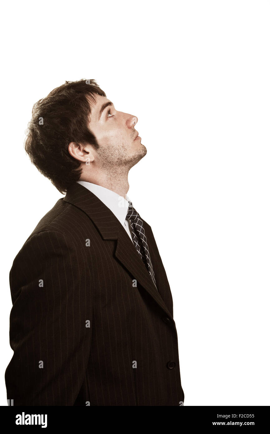 One awaiting isolated business man looking above Stock Photo - Alamy