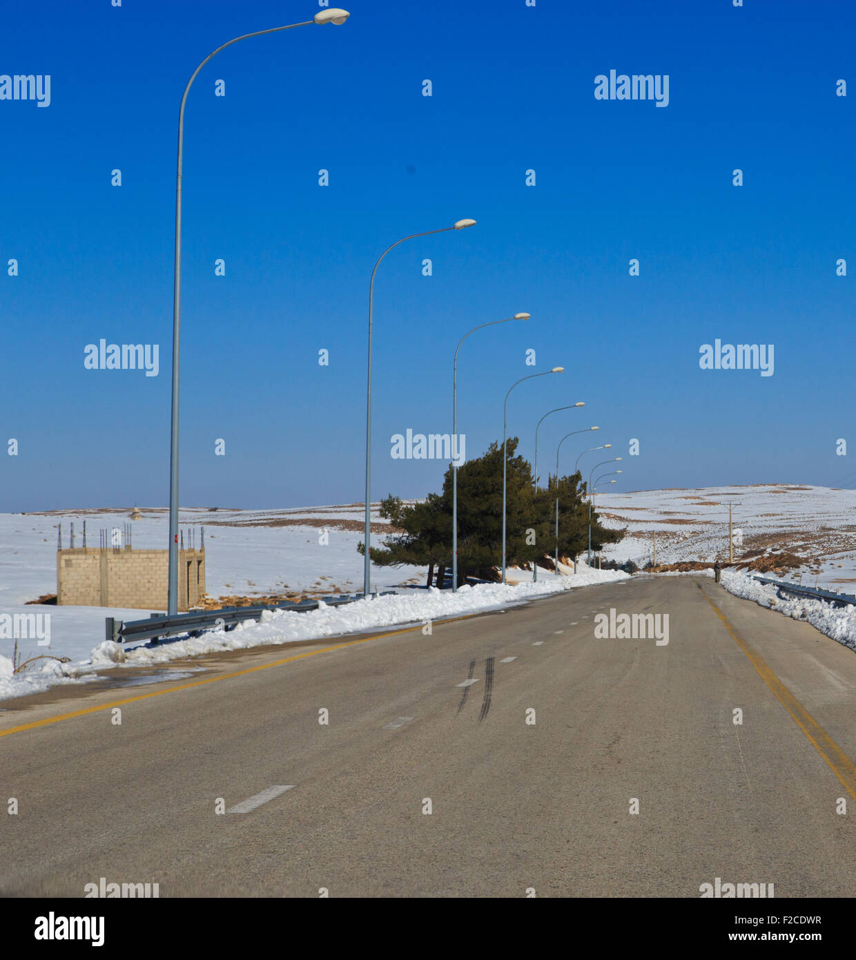 Jordan in snow on the desert highway Stock Photo - Alamy