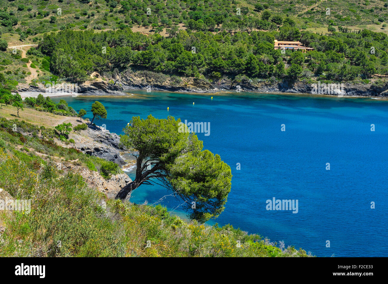 a view of a peaceful cave in the Costa Brava, Catalonia, Spain, with a ...