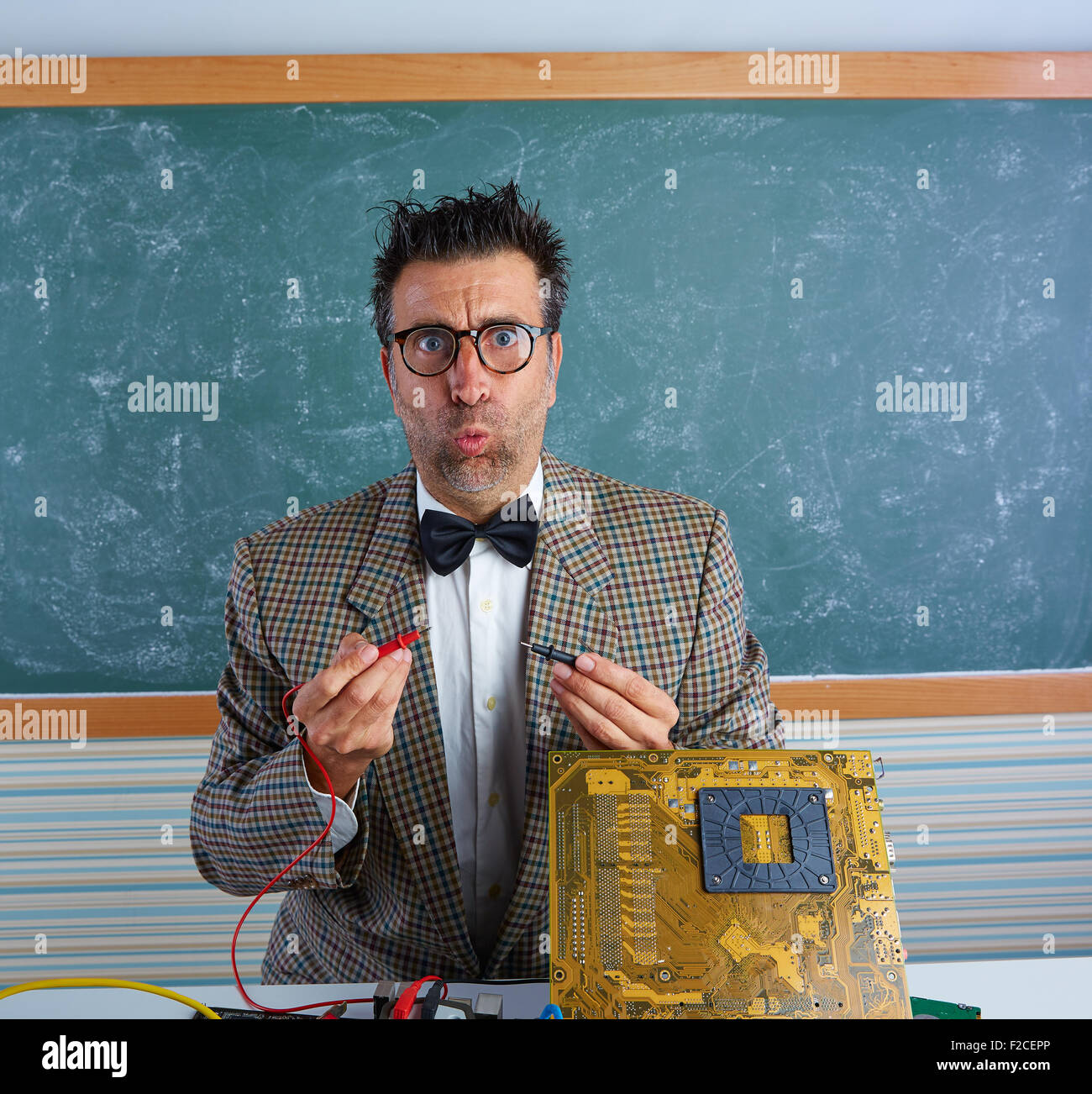 Nerd electronics technician retro teacher silly expression working in ...
