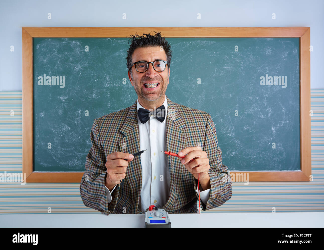 Nerd electronics technician retro teacher silly expression working ...