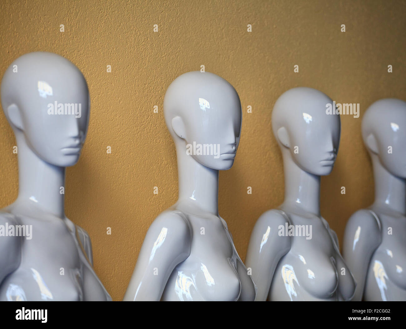 Four Mannequins without dress in a retail shop Stock Photo - Alamy