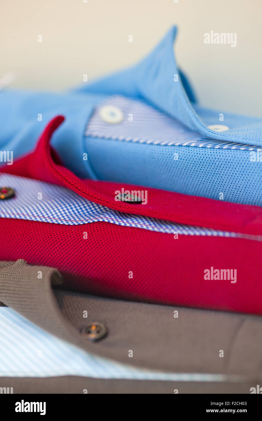 Close up of new colorful Polo shirts Stock Photo - Alamy