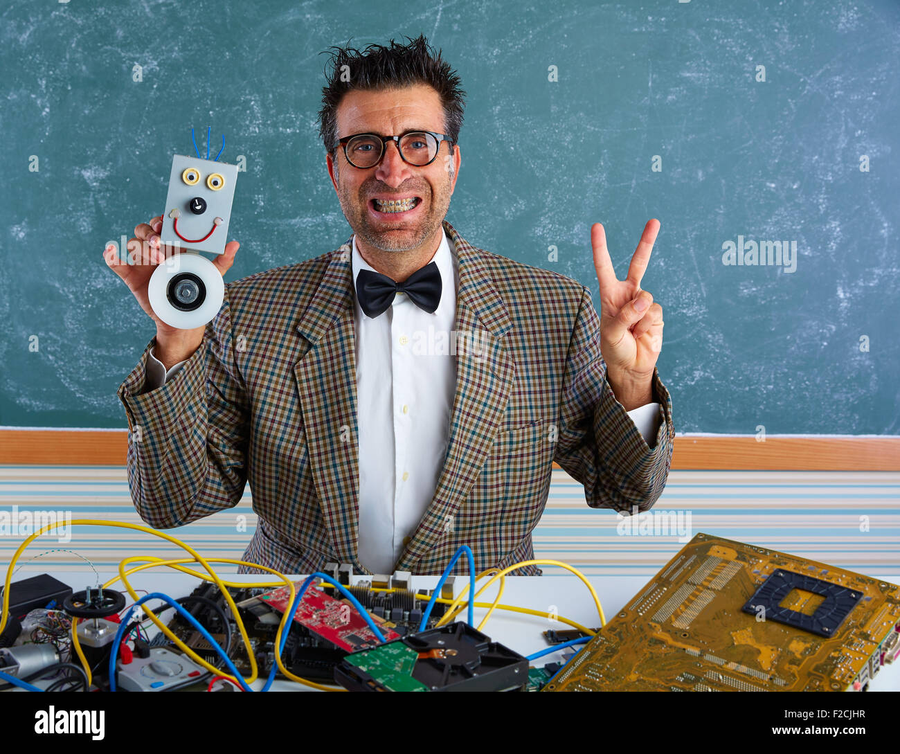 Nerd electronics technician silly teacher retro winner gesture with ...