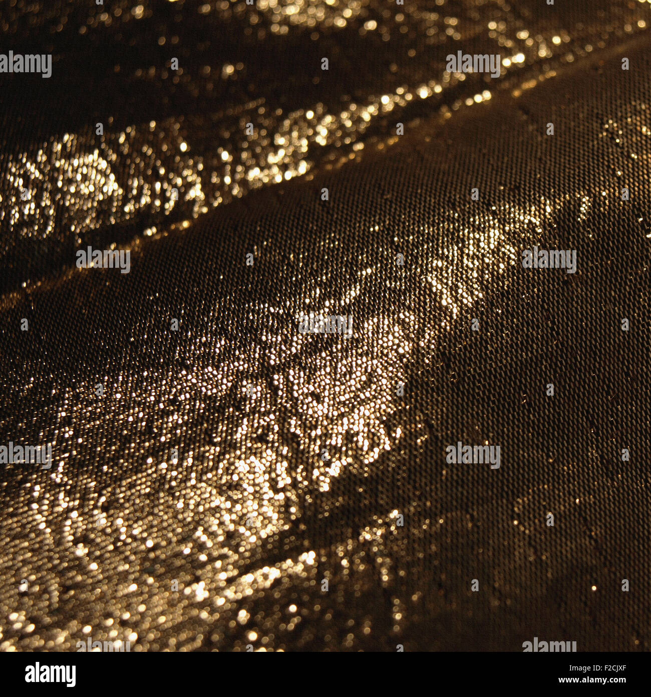 Gold fabric texture hi-res stock photography and images - Alamy
