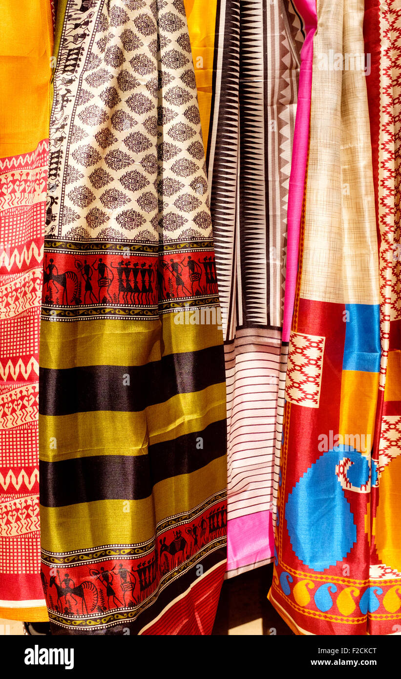 Indian colored shawls close-up hanging in a market Stock Photo - Alamy