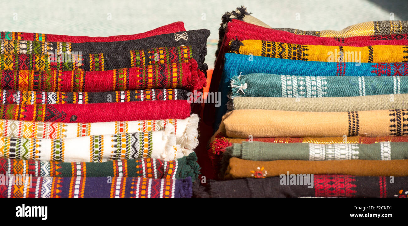 Heap of cloth fabrics at a local market in India. Close up Stock Photo ...