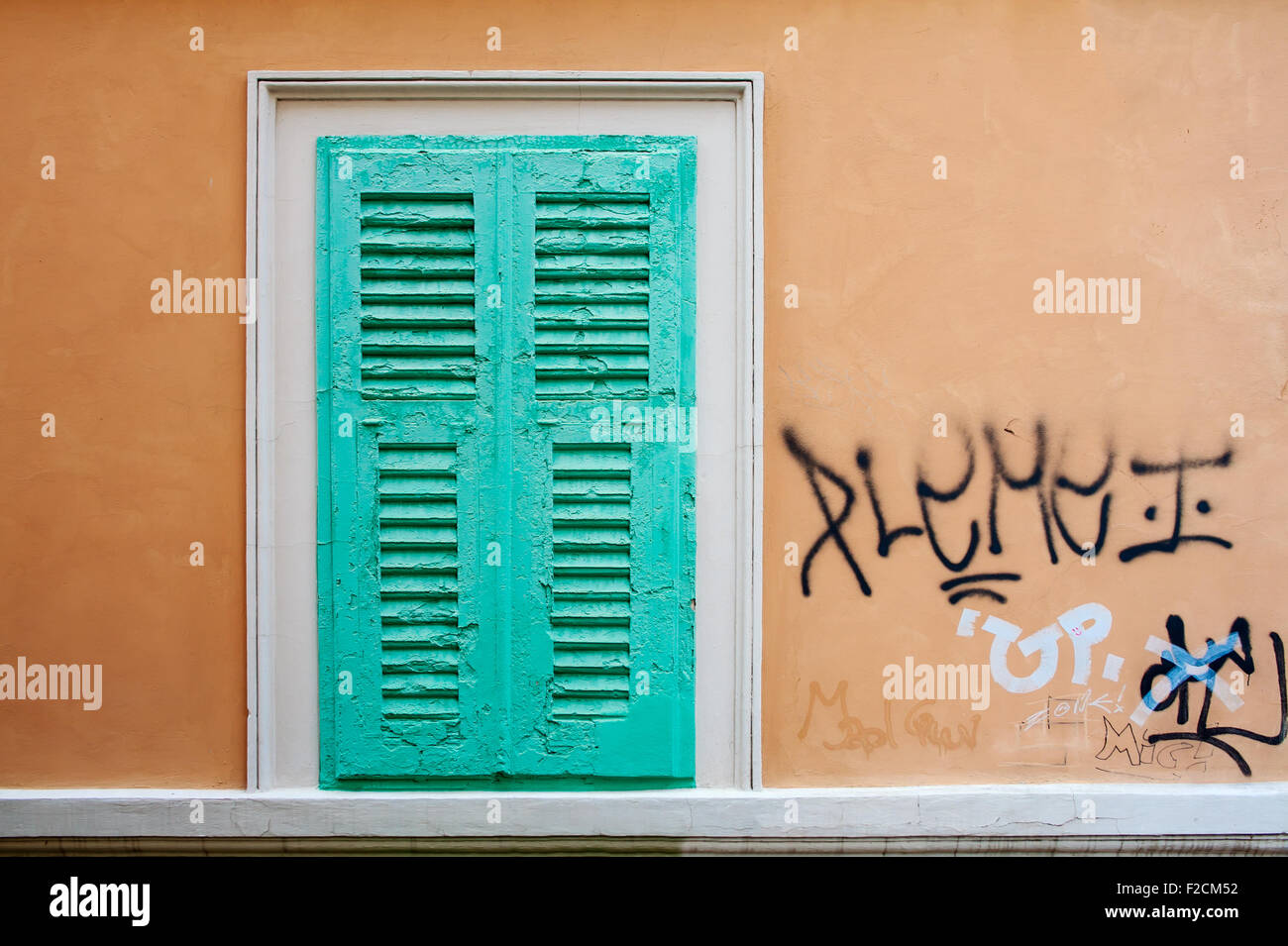 View of green window on wall Stock Photo - Alamy