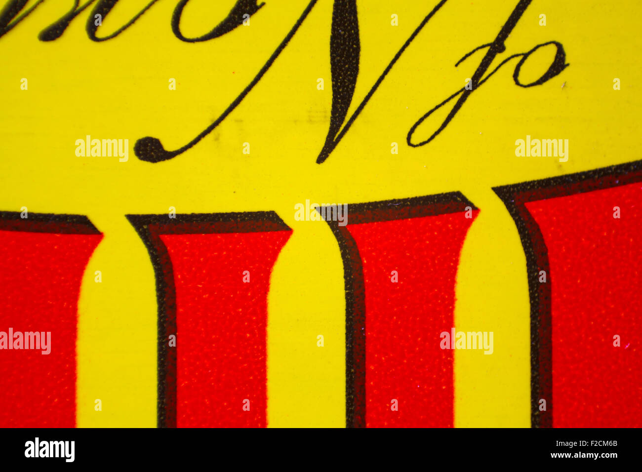 Black letters yellow background hi-res stock photography and images - Alamy