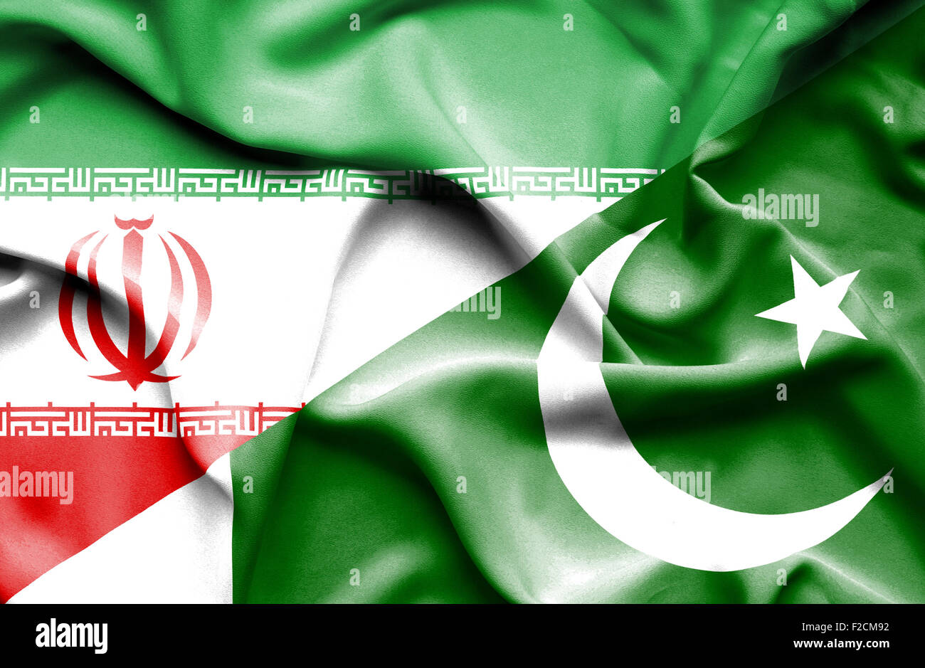 Waving flag of Pakistan and Iran Stock Photo - Alamy
