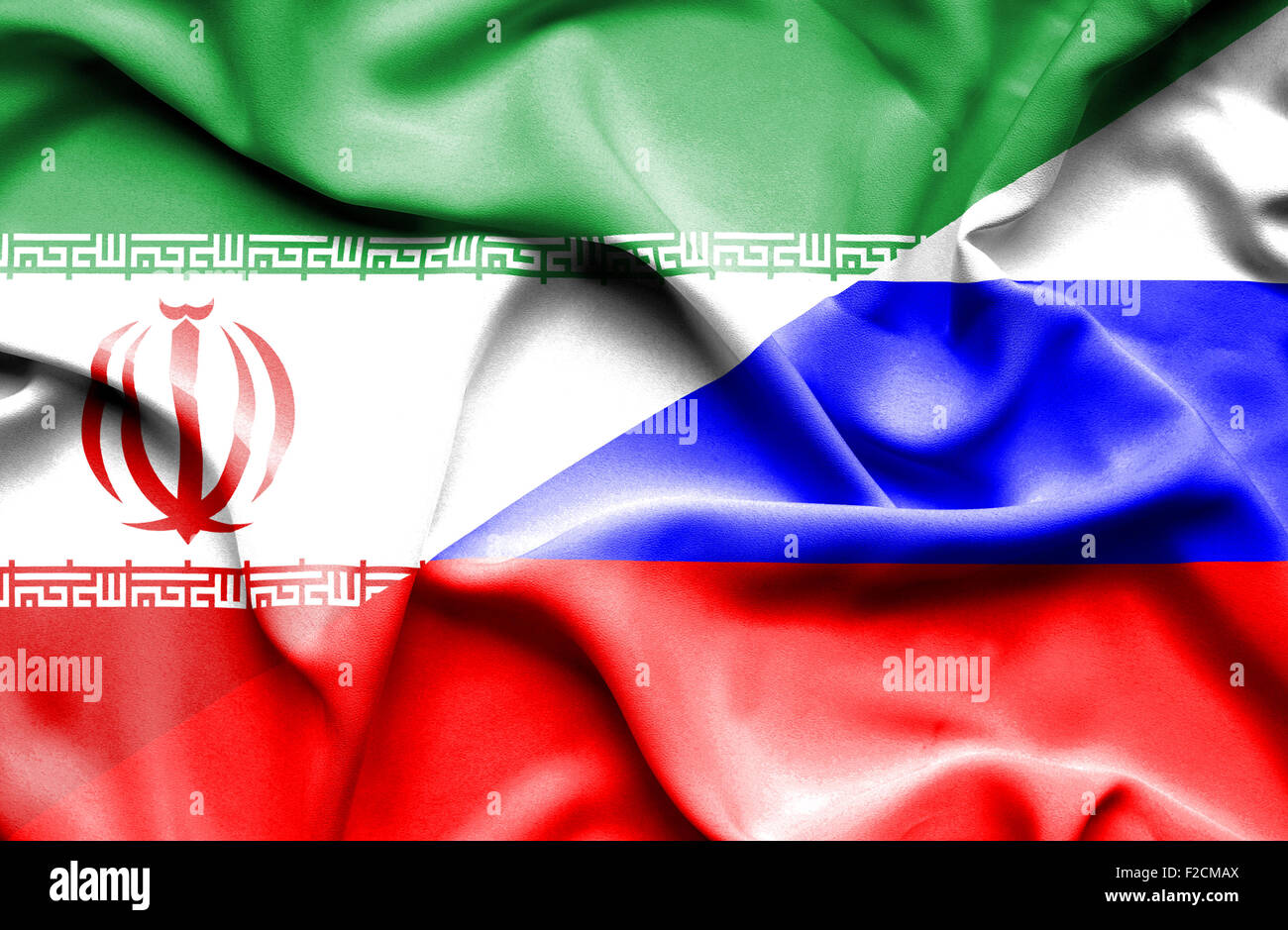 Waving flag of Russia and Iran Stock Photo - Alamy