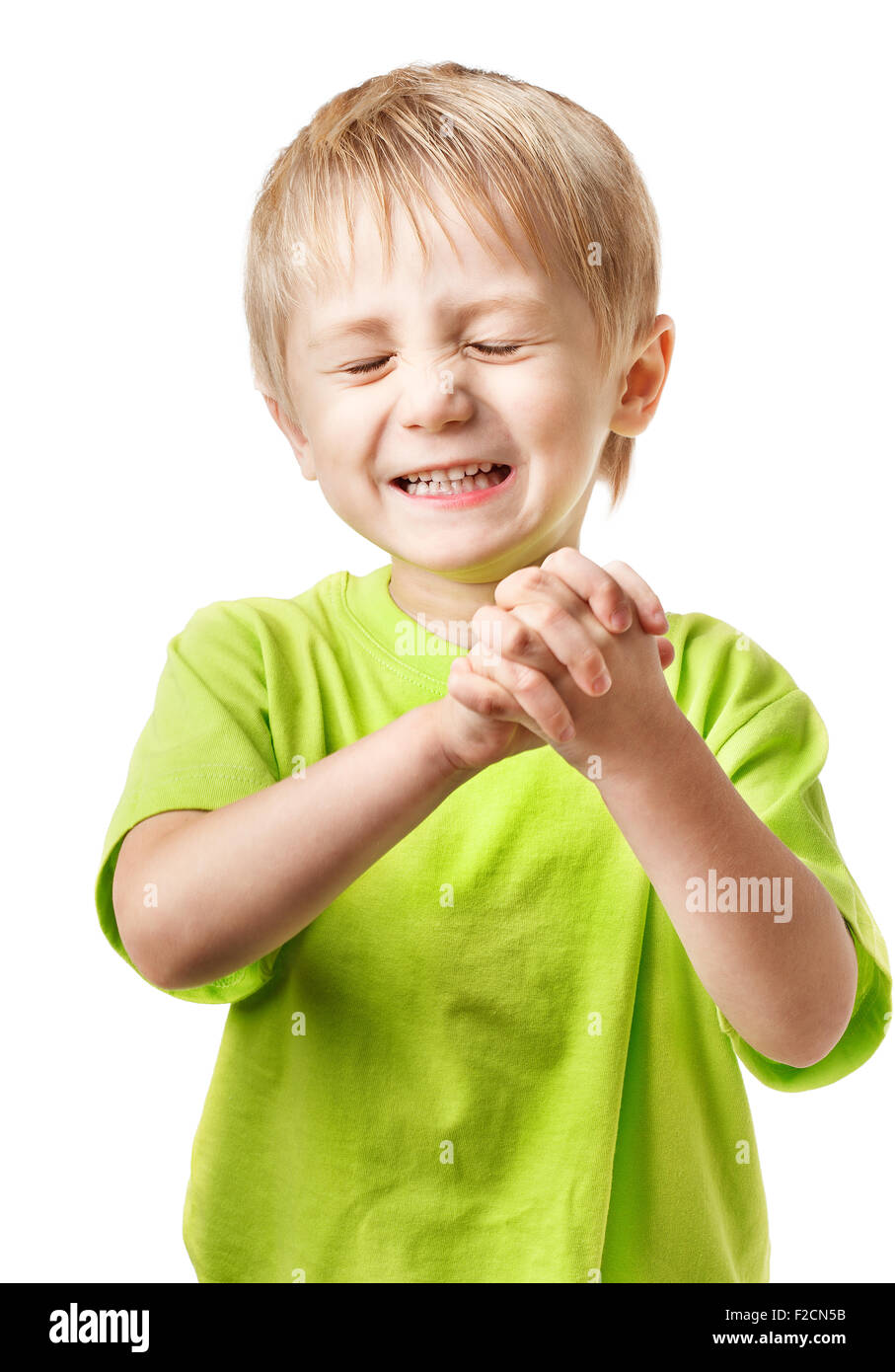 Happy blond boy blinking Stock Photo - Alamy