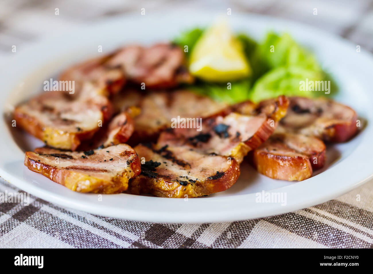 Fresh pork meat in restaurant. Appetizer roast meat Stock Photo - Alamy