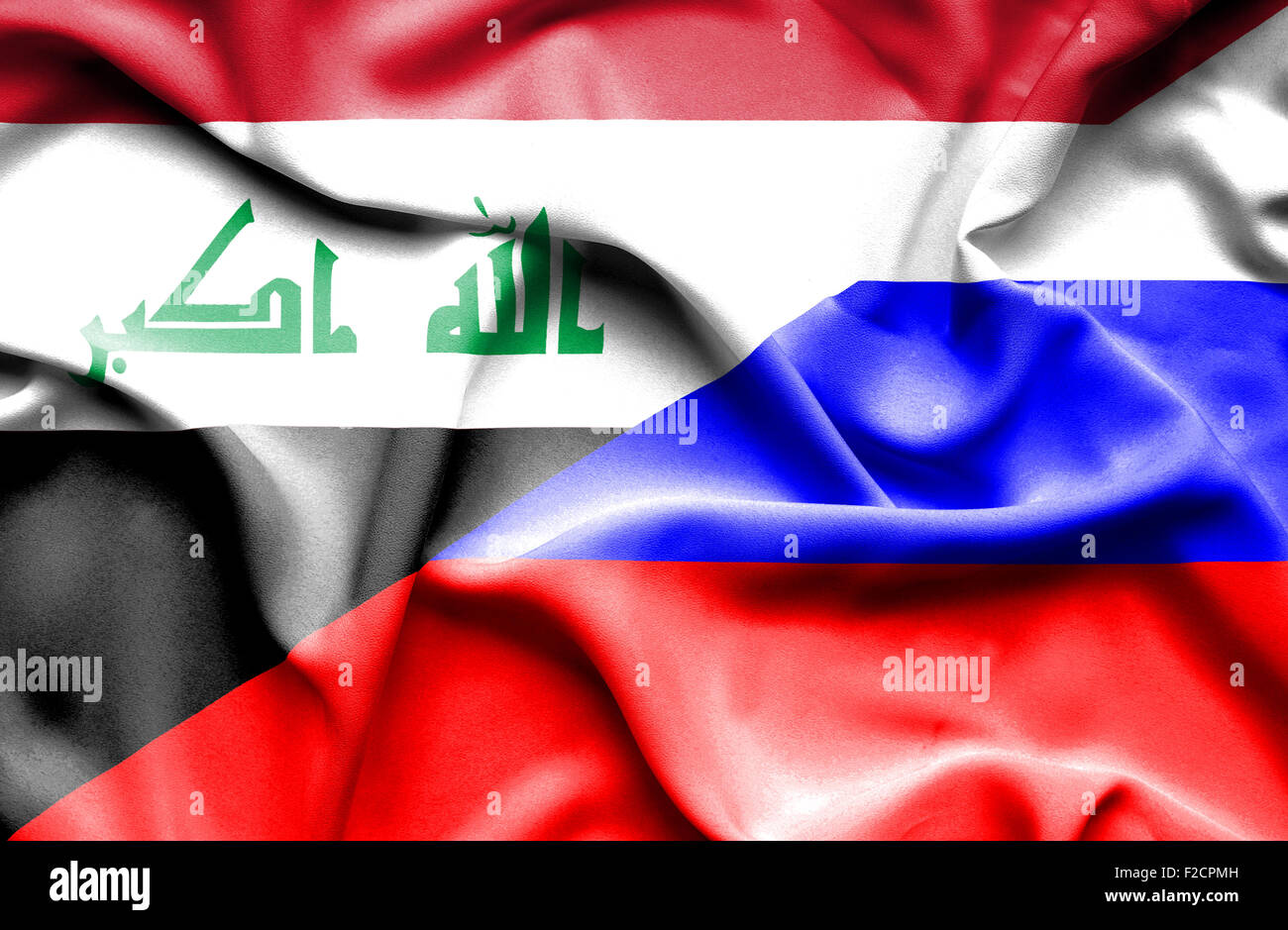 Waving flag of Russia and Iraq Stock Photo - Alamy