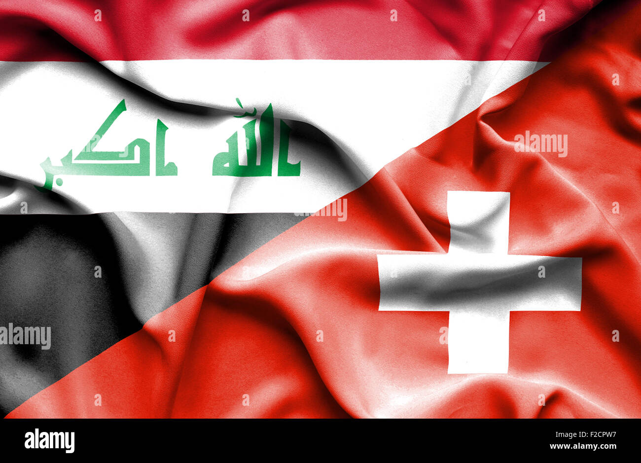 Waving flag of Switzerland and Iraq Stock Photo - Alamy