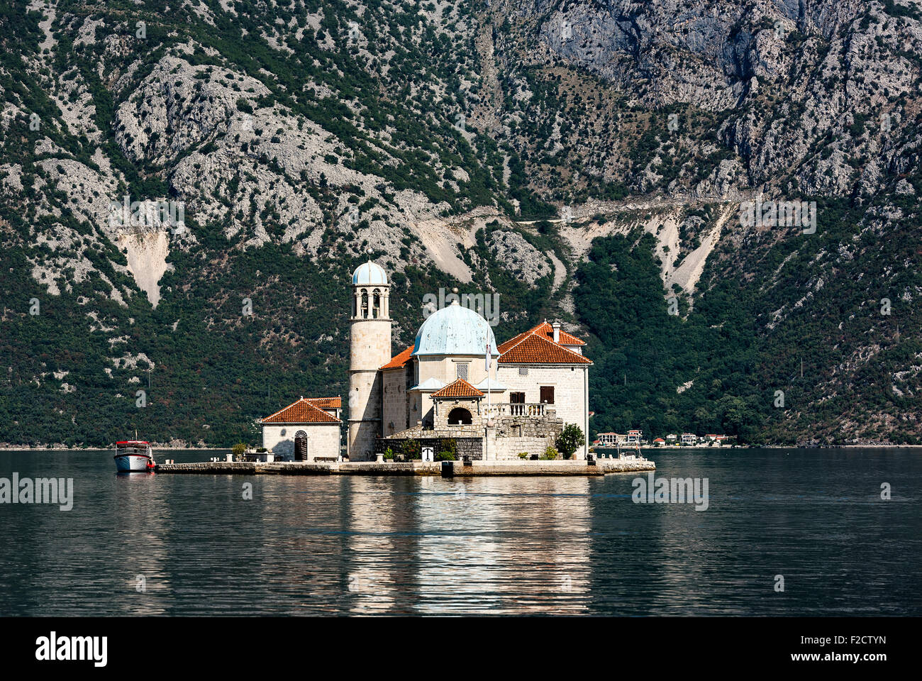 Our Lady of the Rocks church sits on a small man made island in the Bay ...