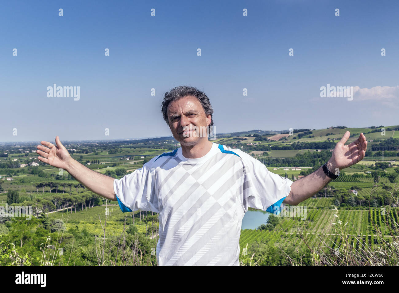 Handsome 40 years old man with salt pepper hair dressed with sports ...