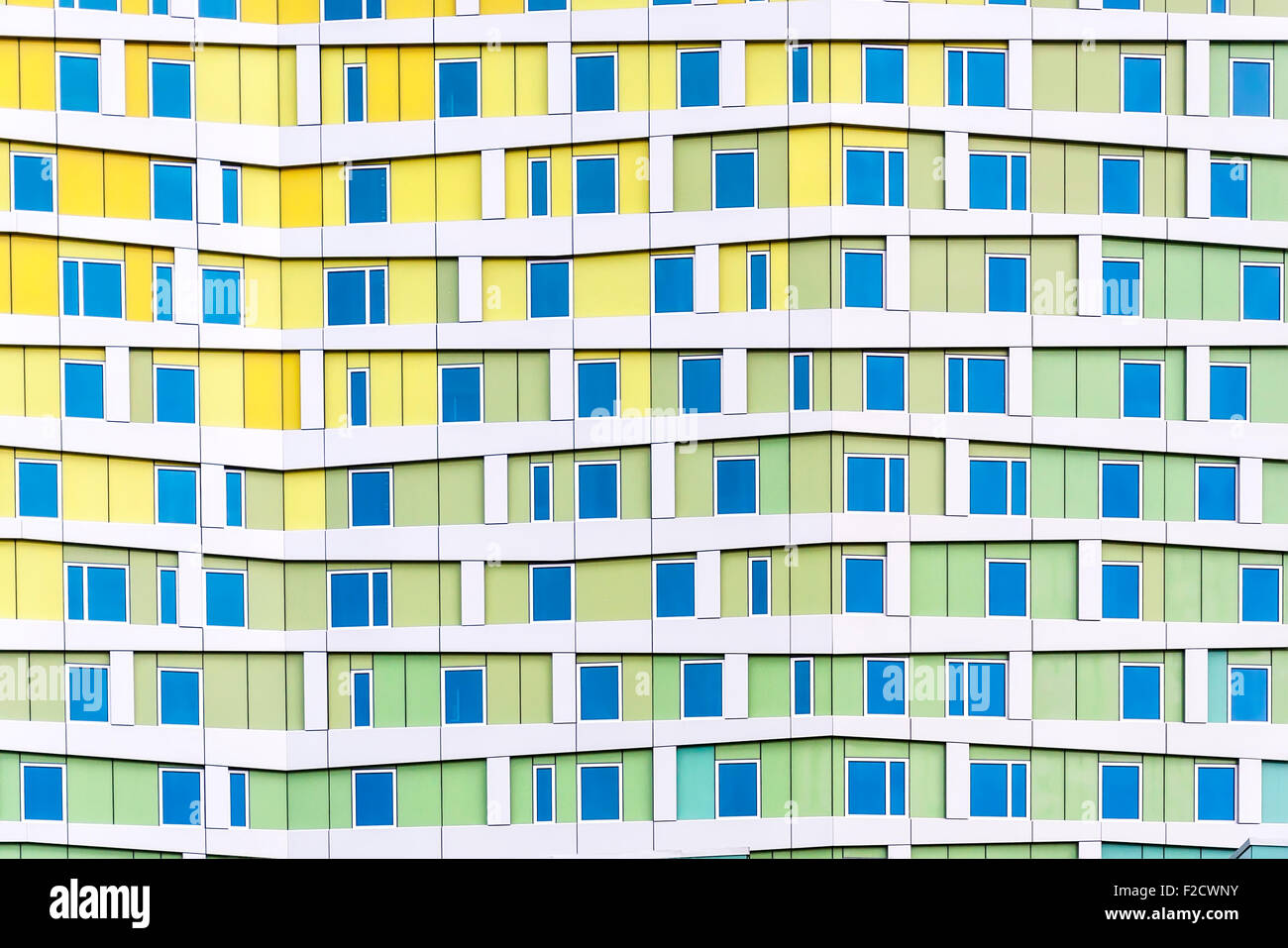The front facade of a modern office block with a very abstract artistic ...