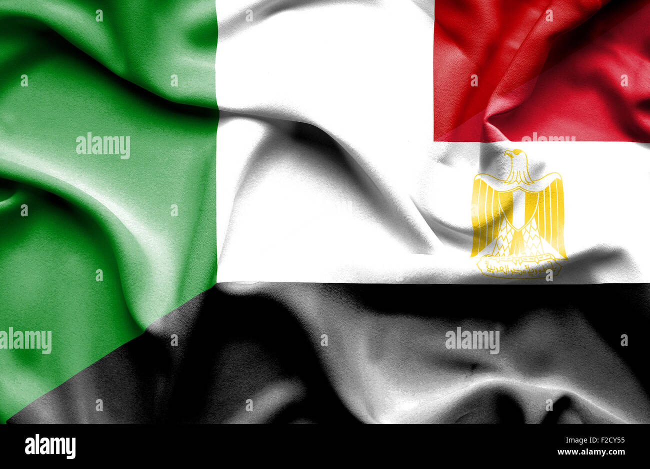 Waving flag of Egypt and Italy Stock Photo - Alamy