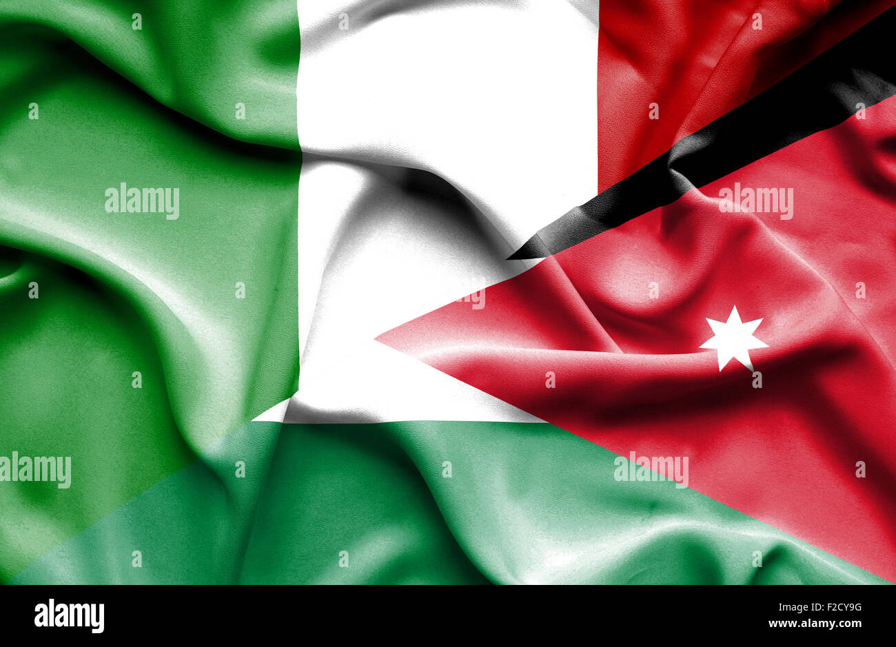 Waving flag of Jordan and Italy Stock Photo - Alamy