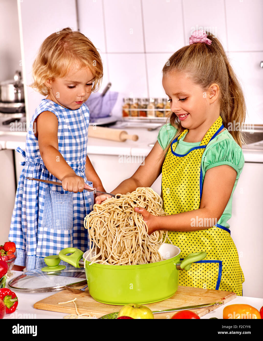 Children cooking at kitchen Stock Photo - Alamy