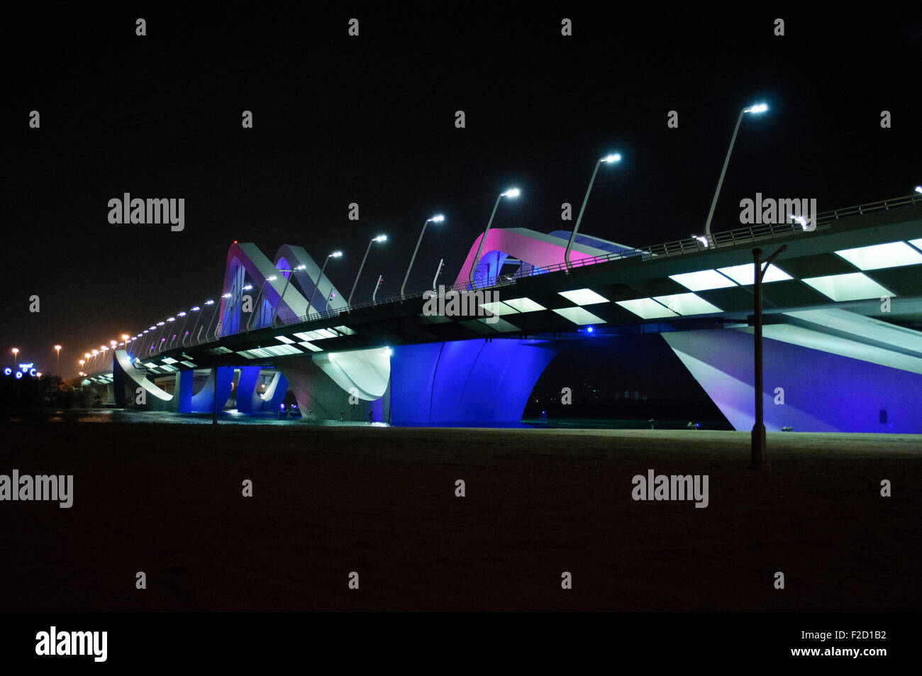 Main bridge in Abu Dhabi, Emirates at night Stock Photo - Alamy