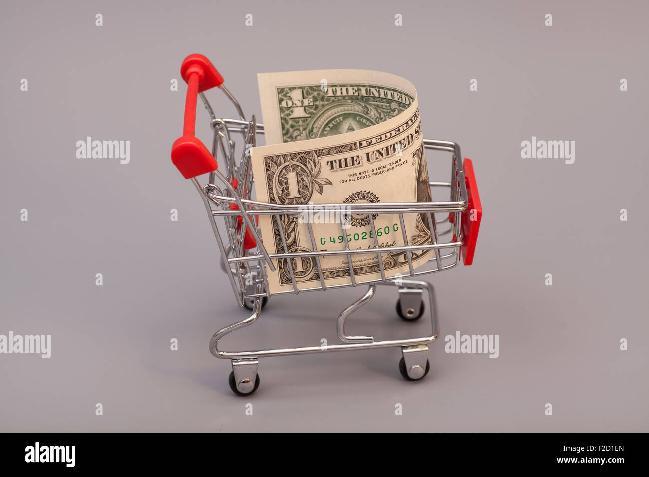 Bundle dollars on gray hi-res stock photography and images - Alamy
